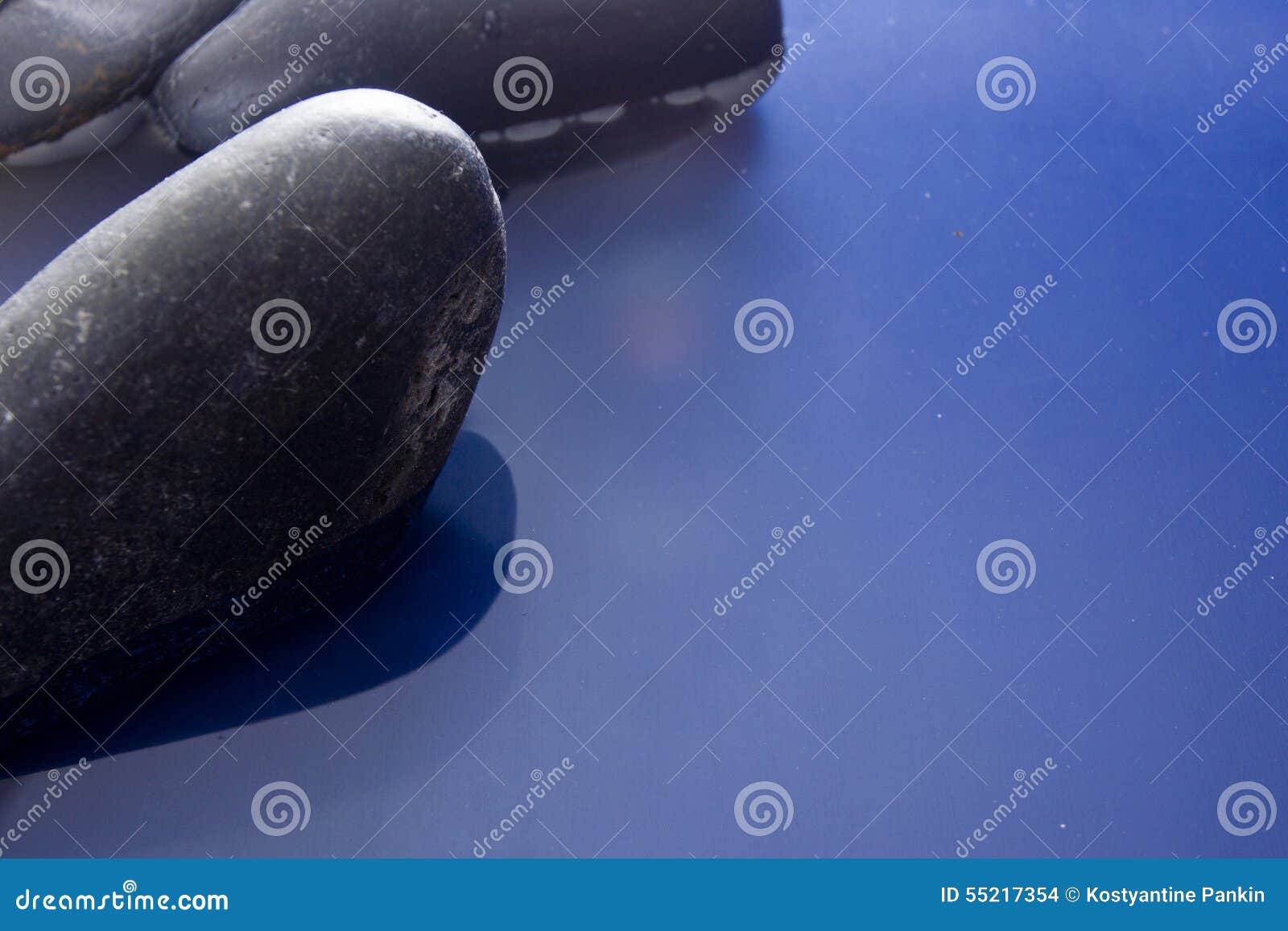 Smooth stones in water stock photo. Image of blue, glowing - 55217354