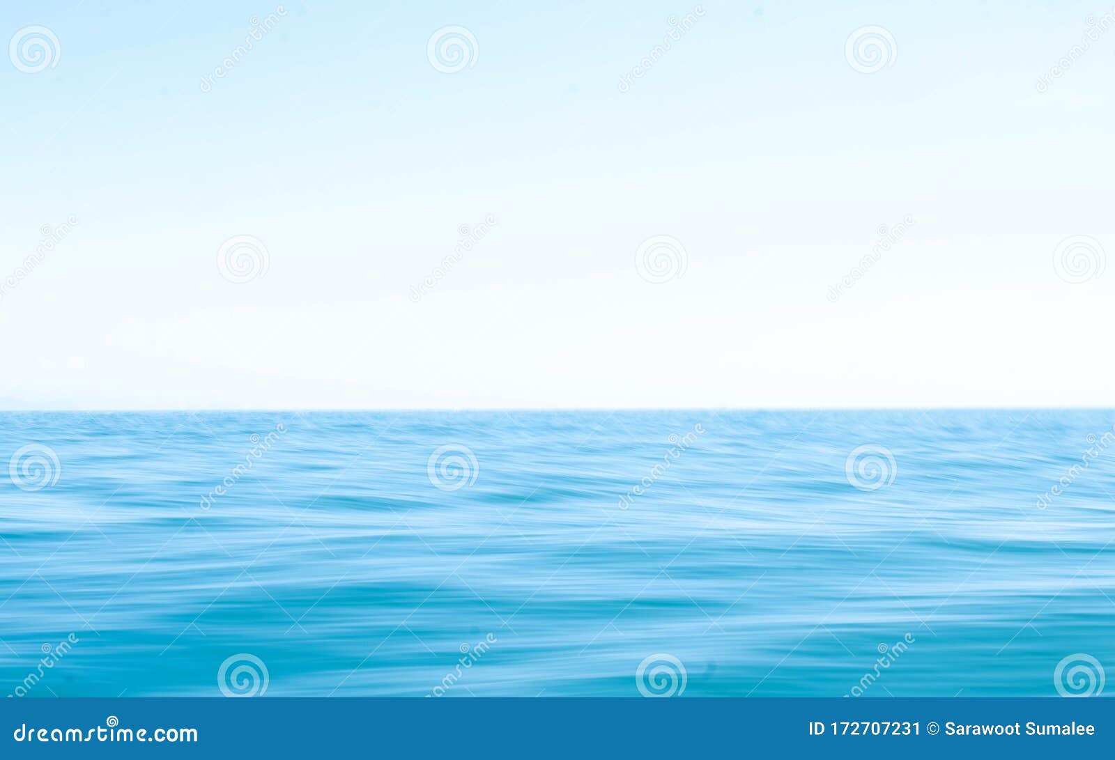 Smooth Surface of the Ocean and Blue Sky Use Techniques Panning and Low ...