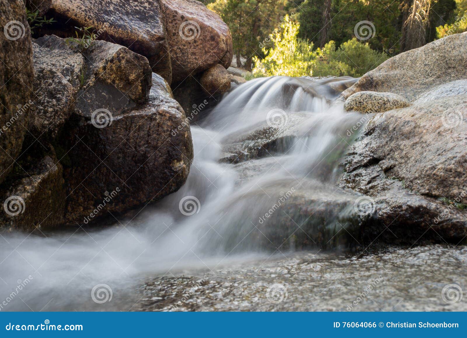 Smooth Water Cascading Over Rocks Stock Photo - Image of mountains ...