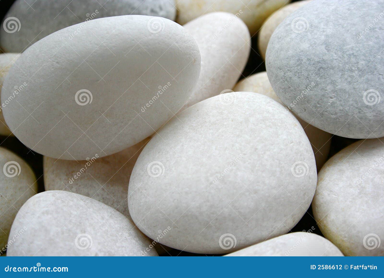 Smooth white pebbles stock photo. Image of holiday, shapes - 2586612