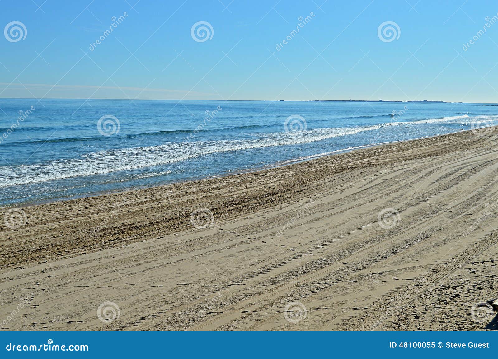A Smoothed and Deserted Beach with a Flat Blue Sea - Empty Paradise ...