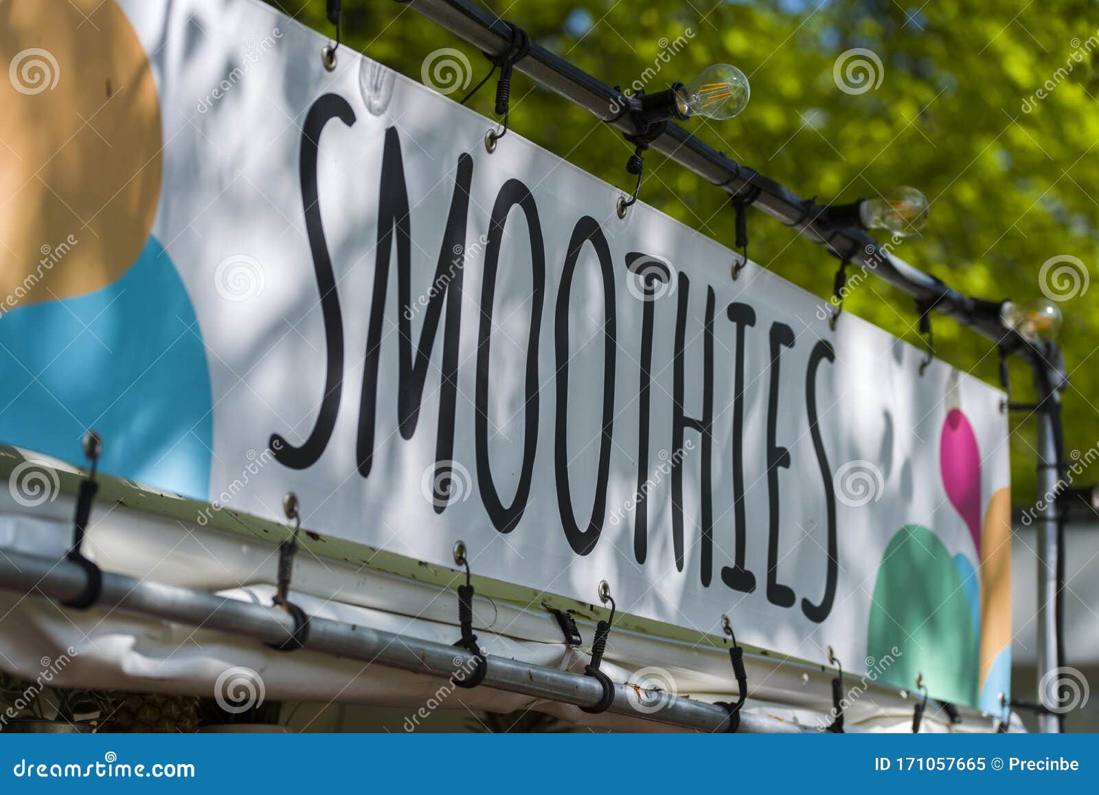 Smoothies Sign in Park in Shadow of Tree Stock Image - Image of ...