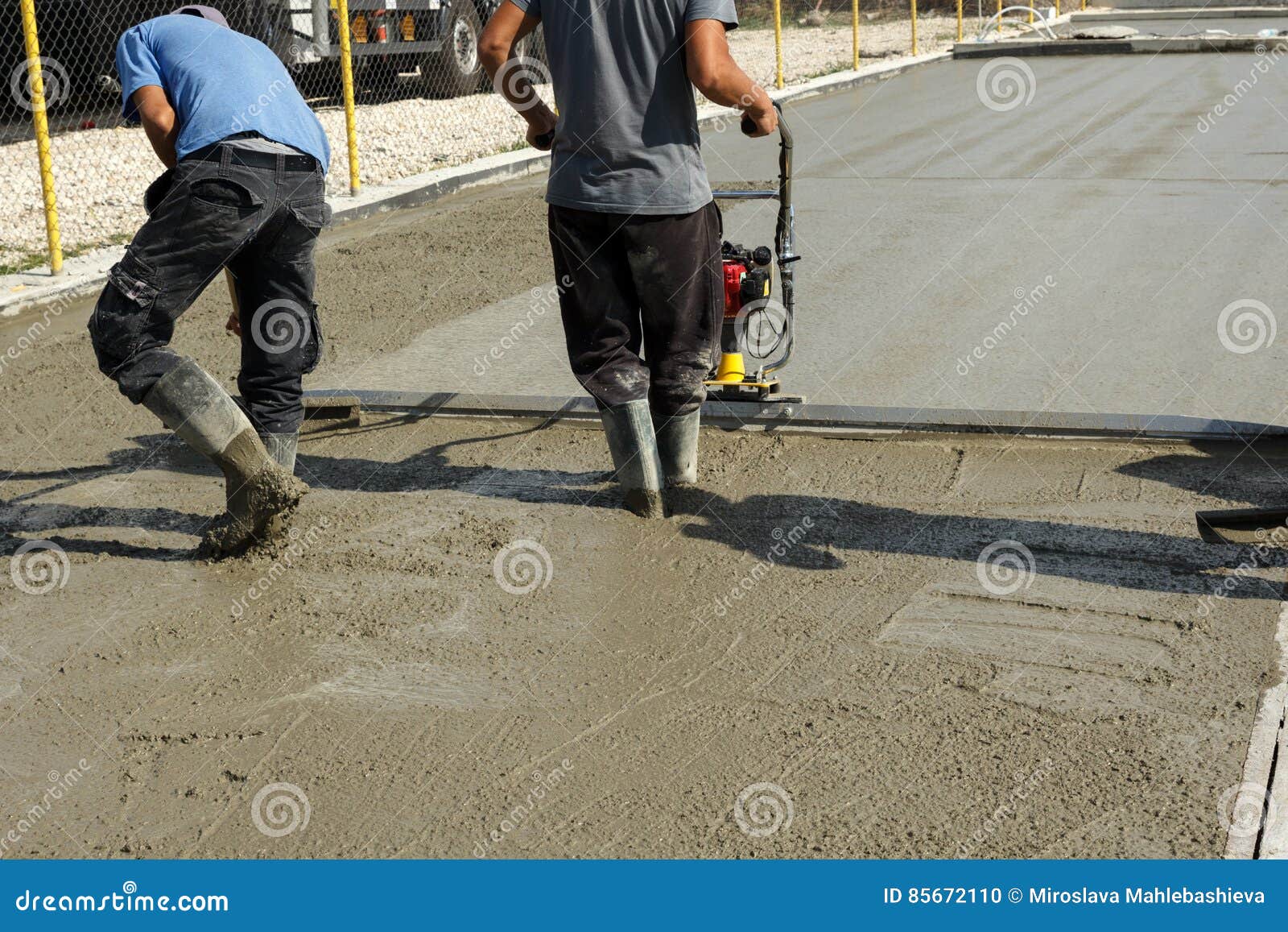 Smoothing Concrete with Vibrating Screed Machine Stock Photo - Image of ...