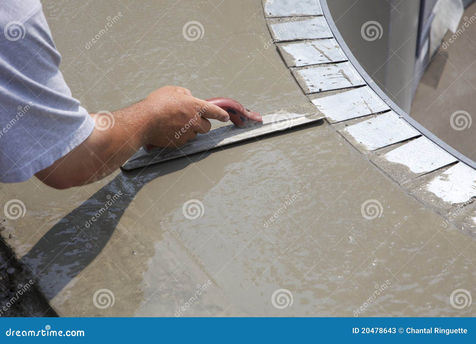 Troweling Fresh Concrete On A Garage Foundation With A Trowel Left On ...