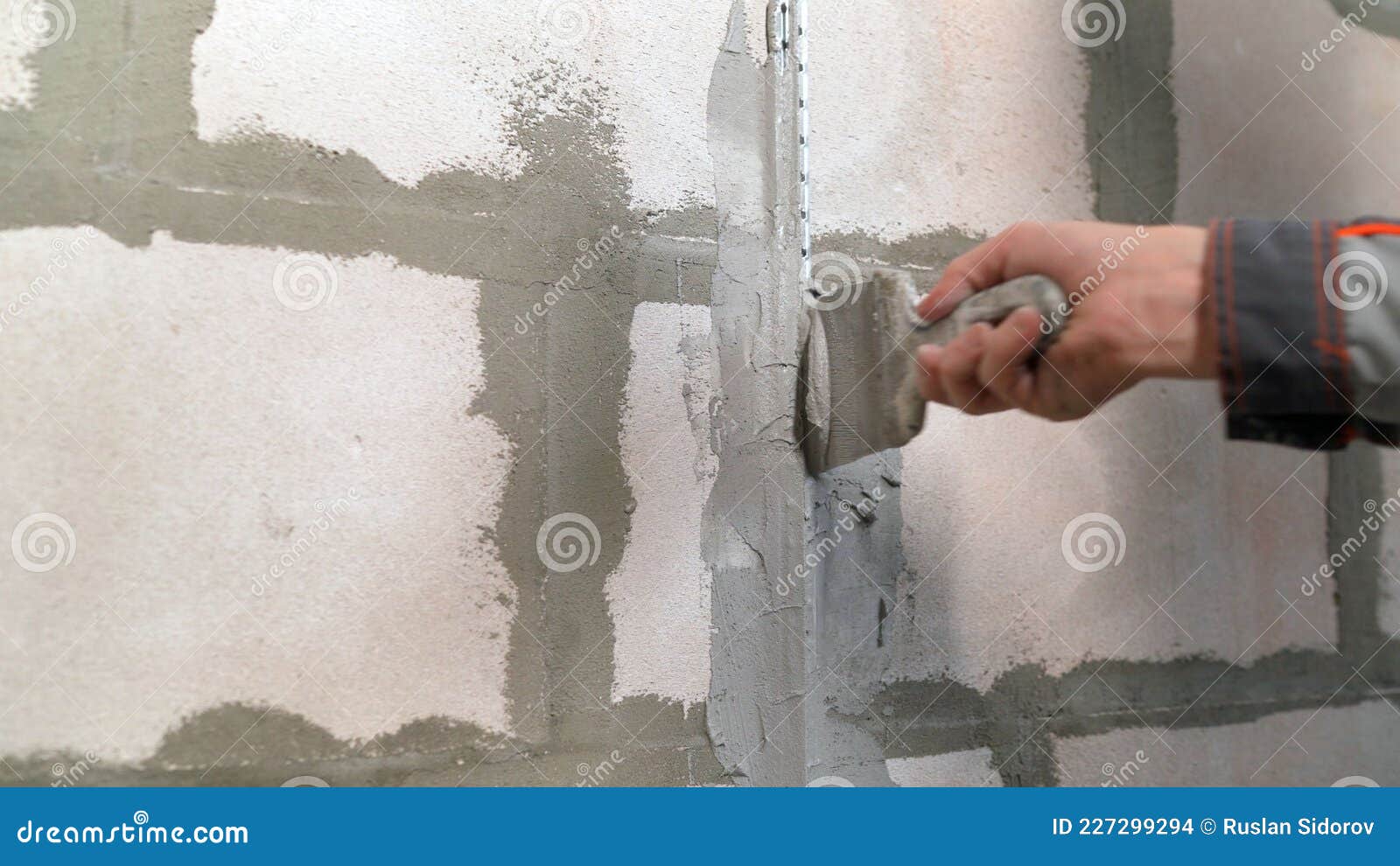 Plaster the Wall with a Putty Knife.Internal Construction and Finishing ...