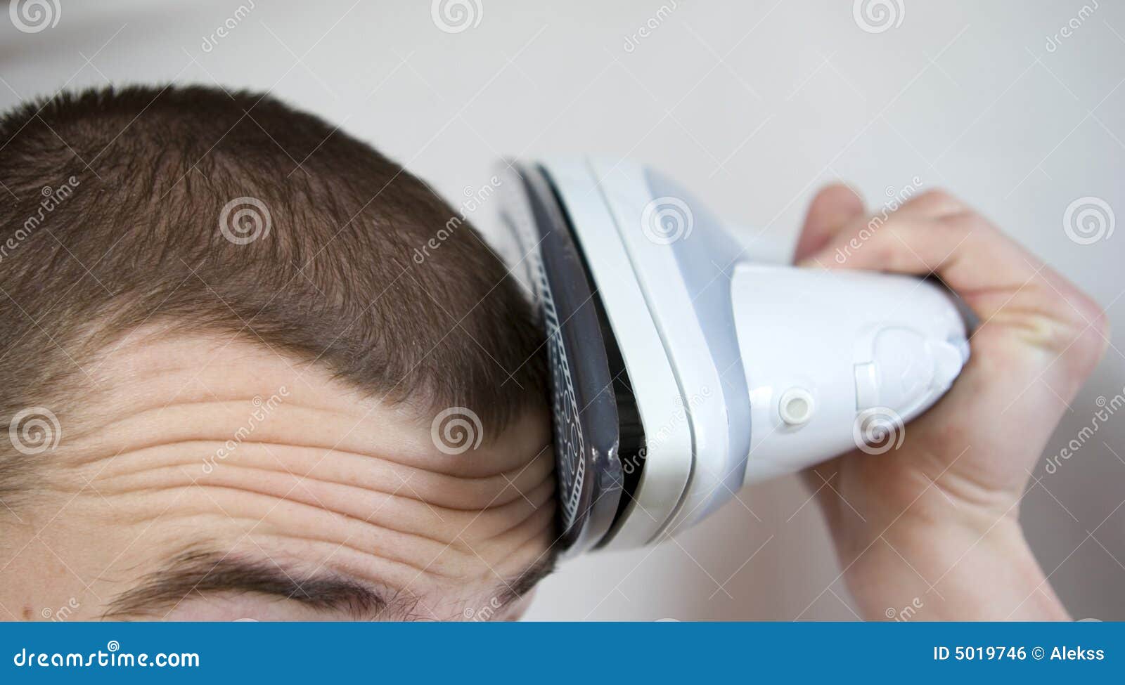 Smoothing out of wrinkles stock photo. Image of male, electric - 5019746