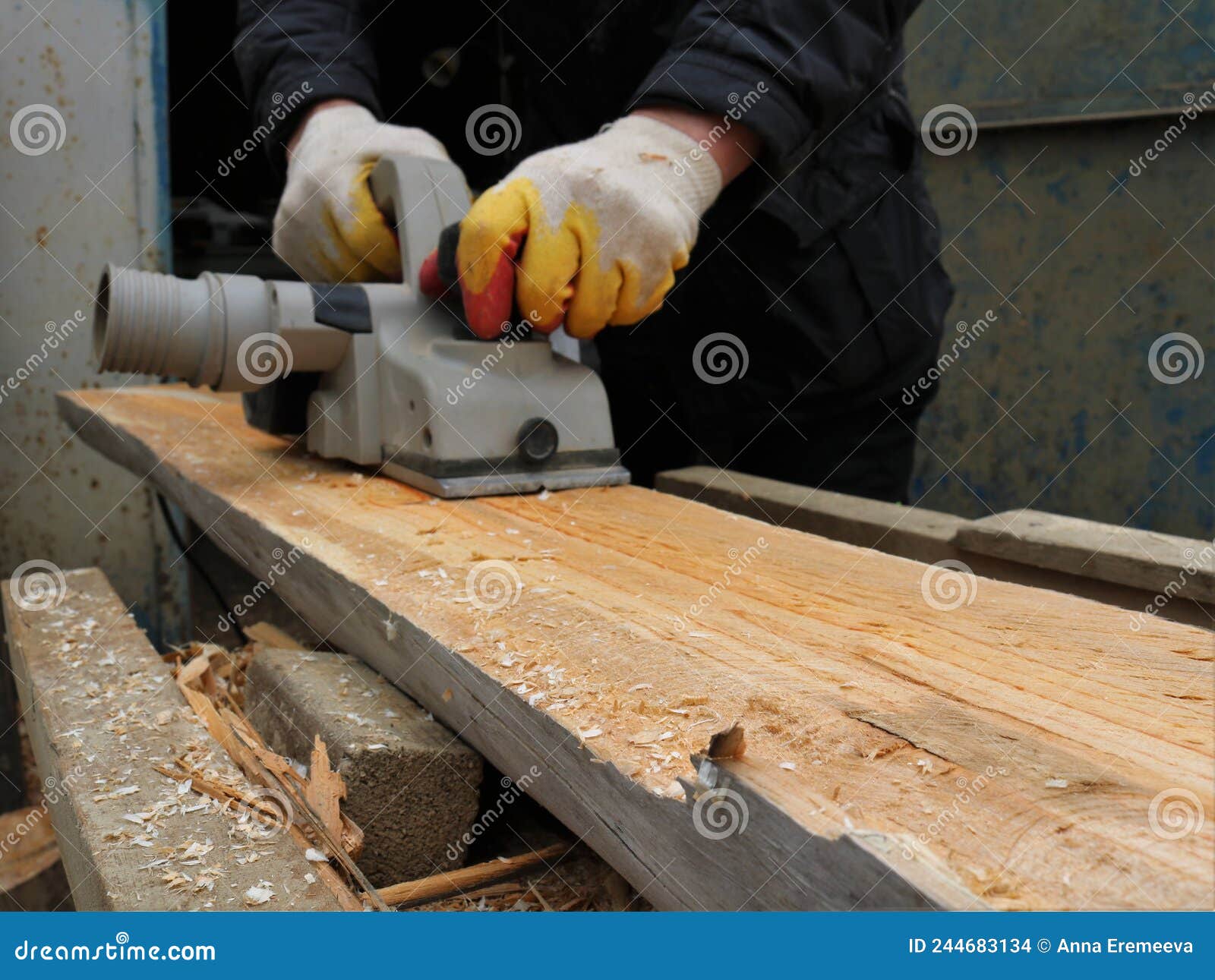 Smoothing the Surface of a Wooden Log with a Planer Stock Photo - Image ...
