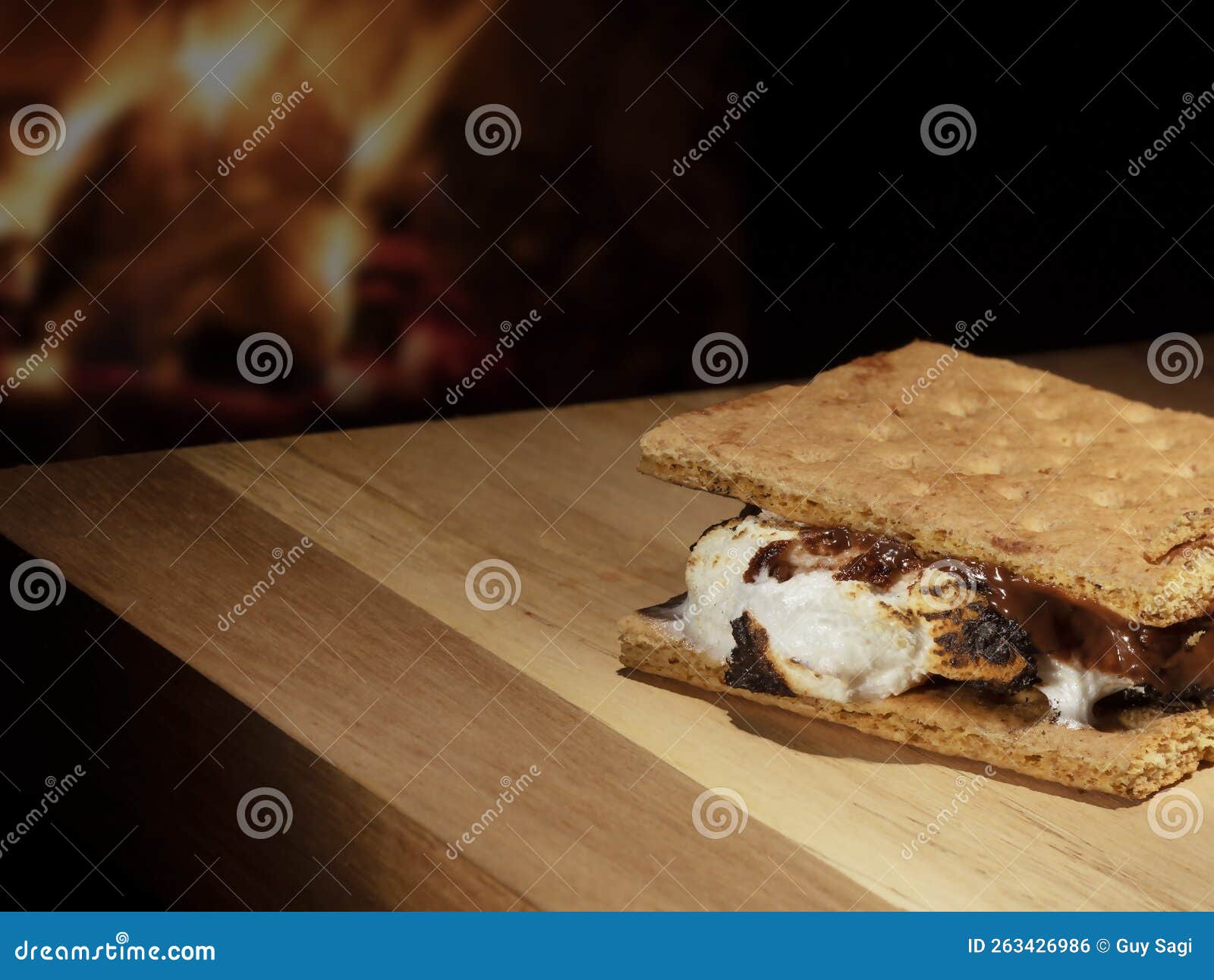 Smore on a wood surface stock photo. Image of campfire - 263426986