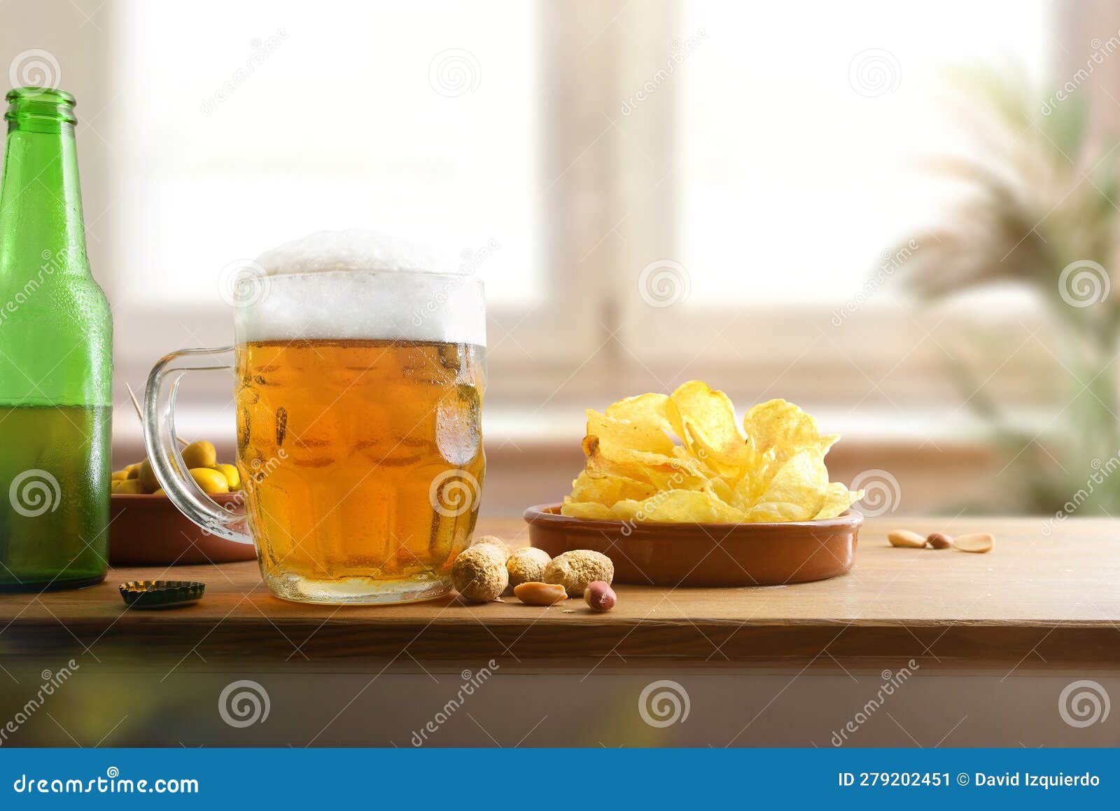 Snack on Bench with Beer Mug and Window in Background Stock Image ...