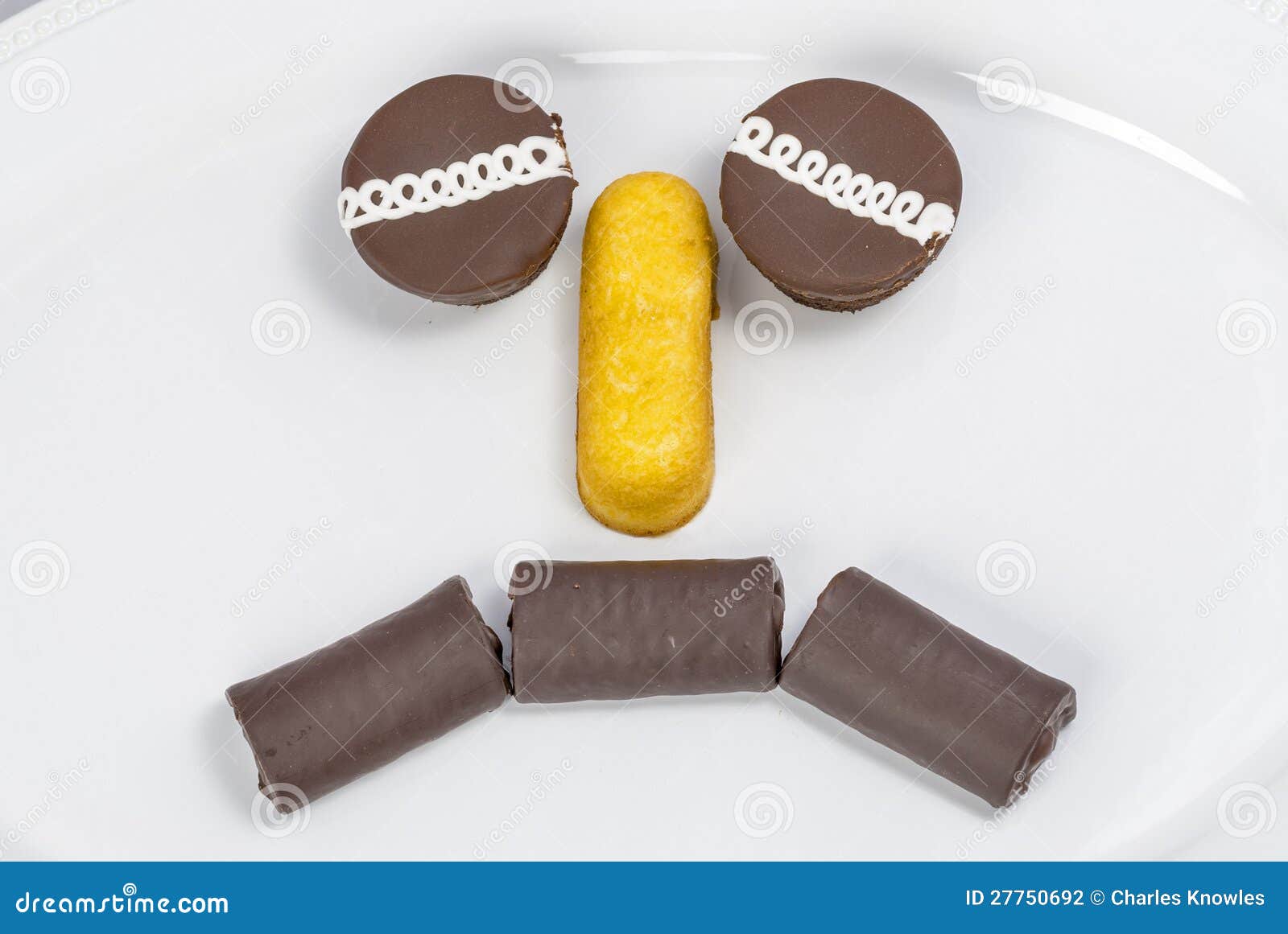 Snack Cakes in the Shape of a Sad Face Stock Photo - Image of food ...