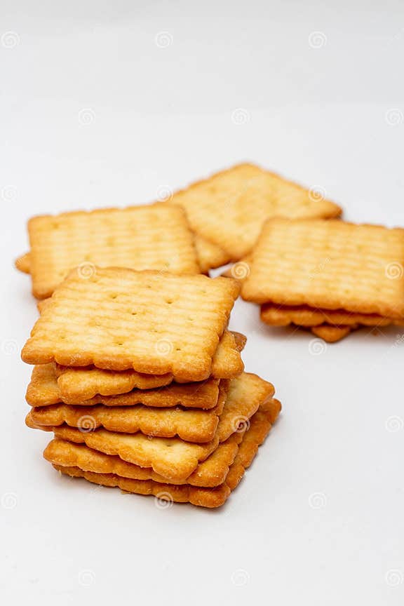 Snack Concept, Salty Crackers or Biscuits are Stack in Heap Isolated on ...