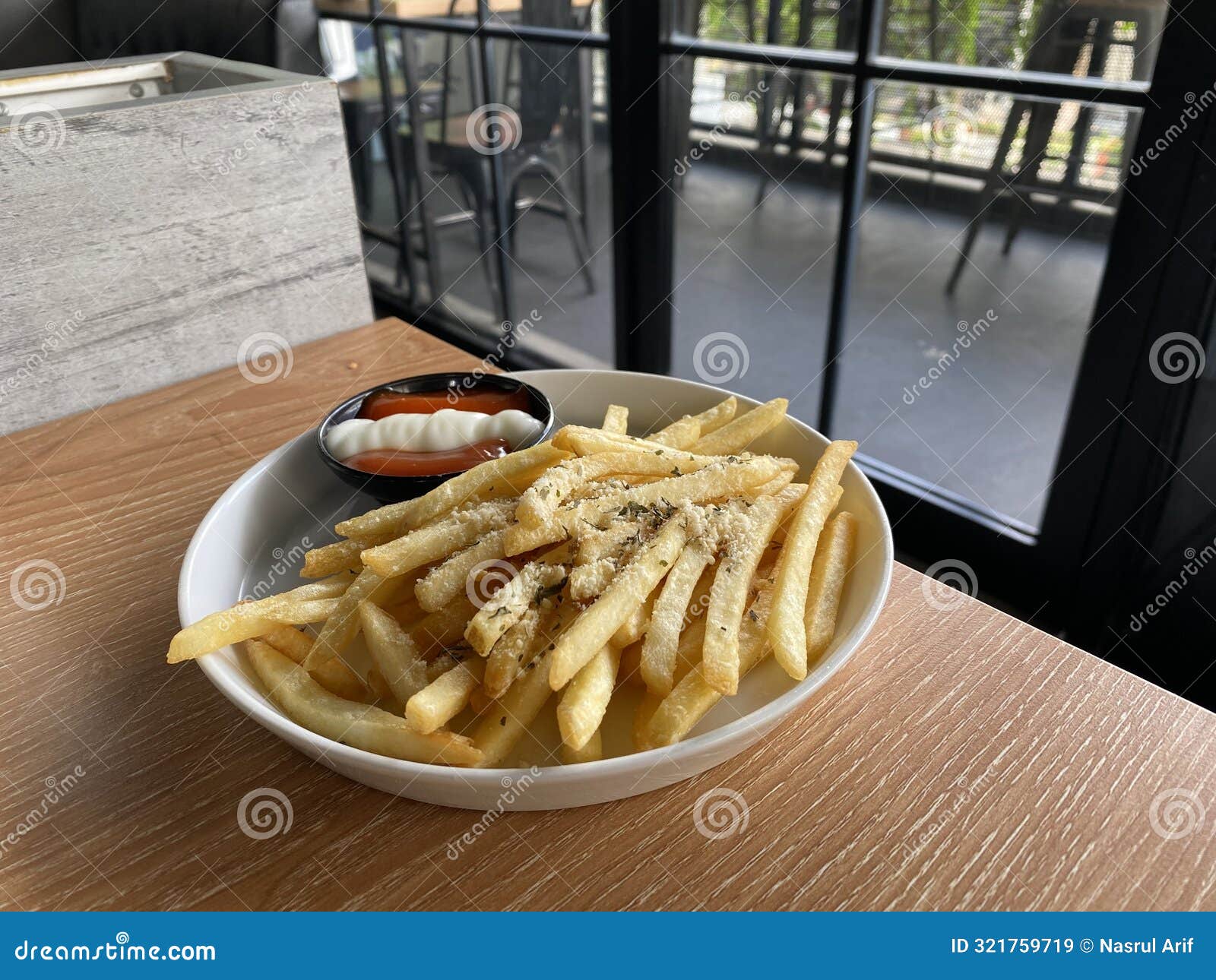 Snacking on French Fries at the Coffee Shop Table Stock Image - Image of bite, crunch: 321759719