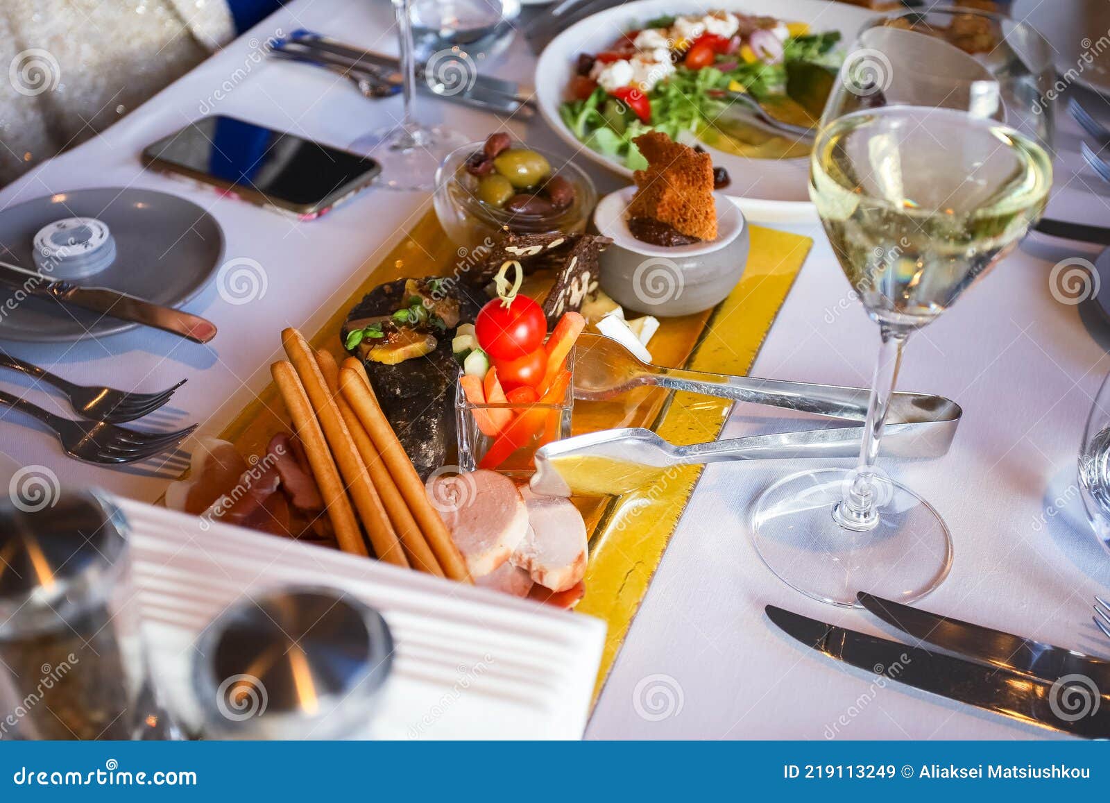 Snacks at the Banquet Table in the Restaurant. Table Setting. Editorial ...