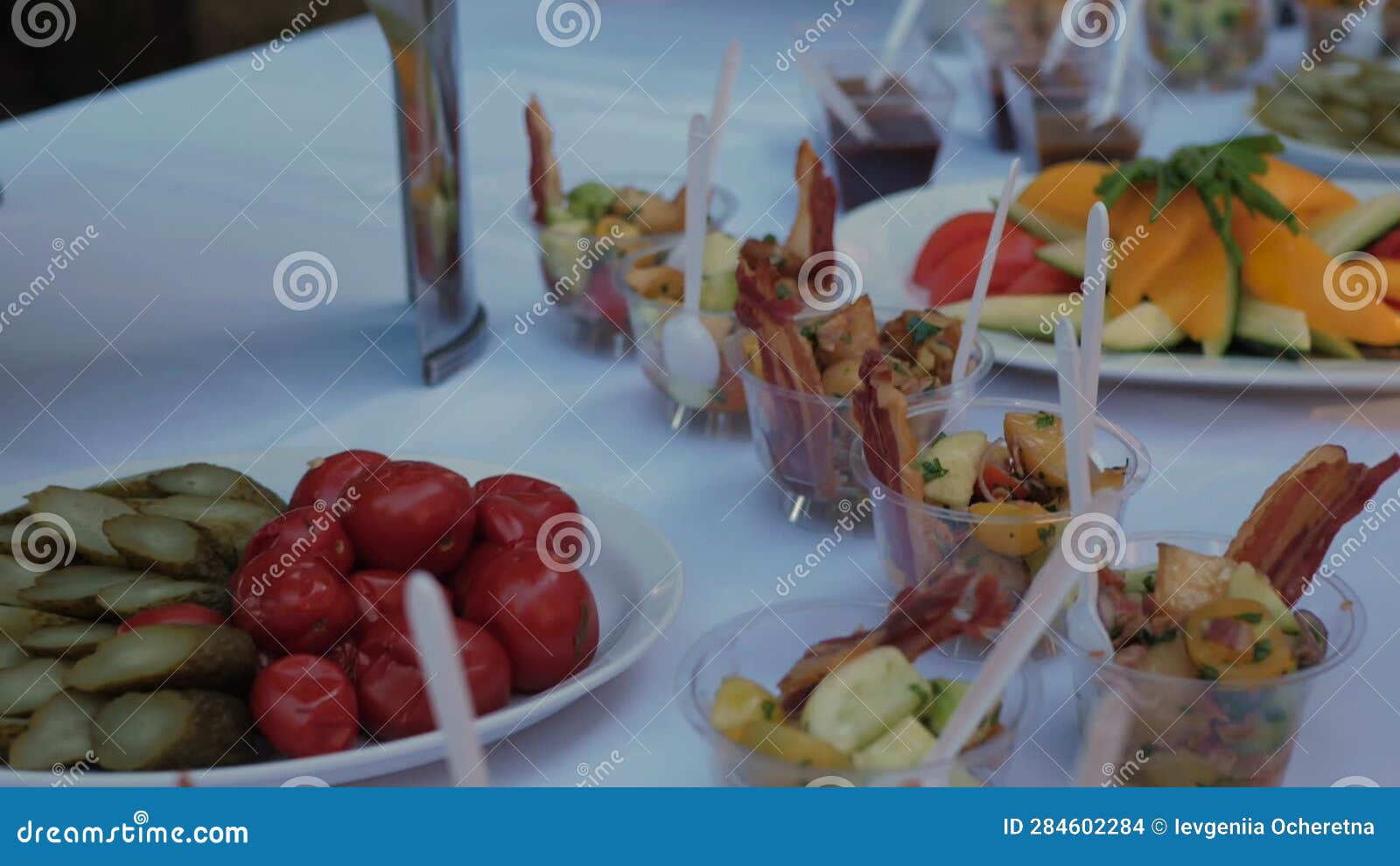 Snacks in plastic cups stock footage. Video of pickle - 284602284