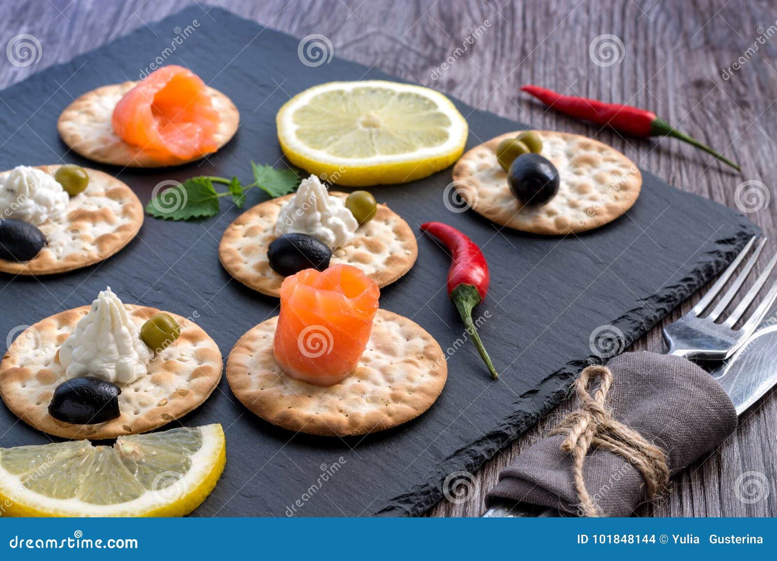 Snacks on the Slate Plate. Crackers with Cheese and Red Fish. Stock ...