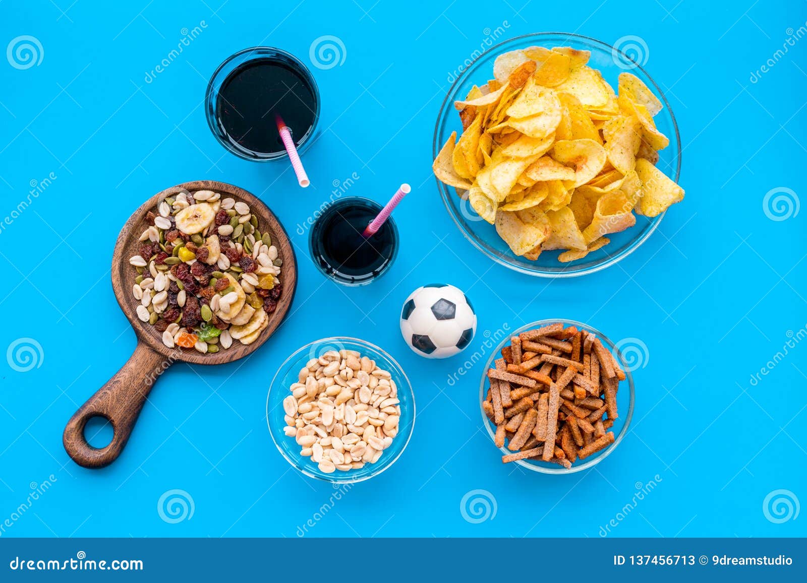 Snacks for TV Watching. Chips, Nuts, Soda, Rusks on Blue Background Top ...