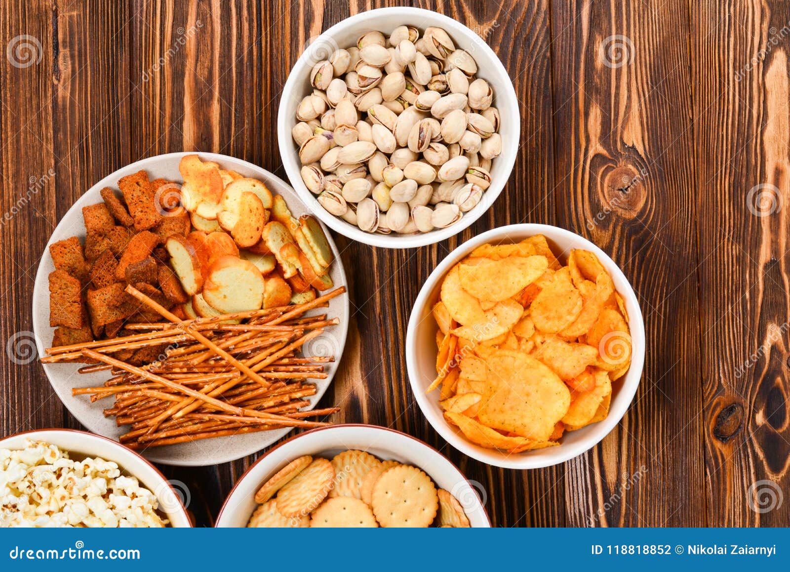 Snacks on a Wooden Background. Stock Photo - Image of assortment, snack ...