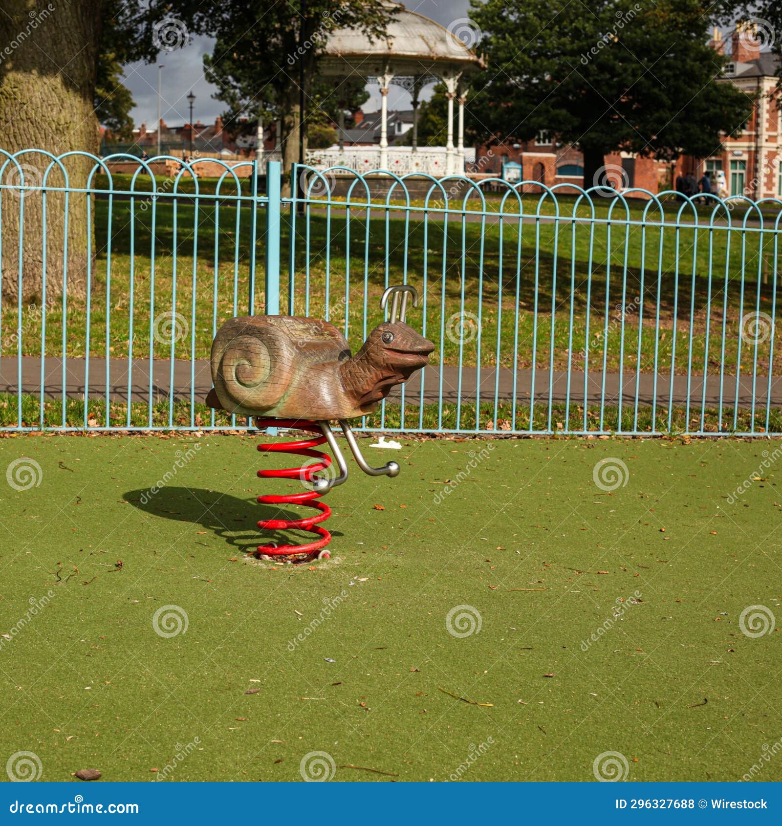 Snail-shaped Spring Rider Installed in a Public Park Setting Stock ...