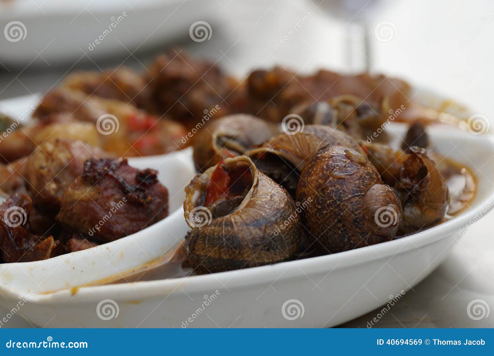 Snails as Tapas stock image. Image of mollusks, canary - 40694569