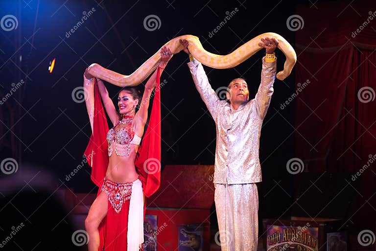 Snake show in circus editorial stock image. Image of watching - 23080574