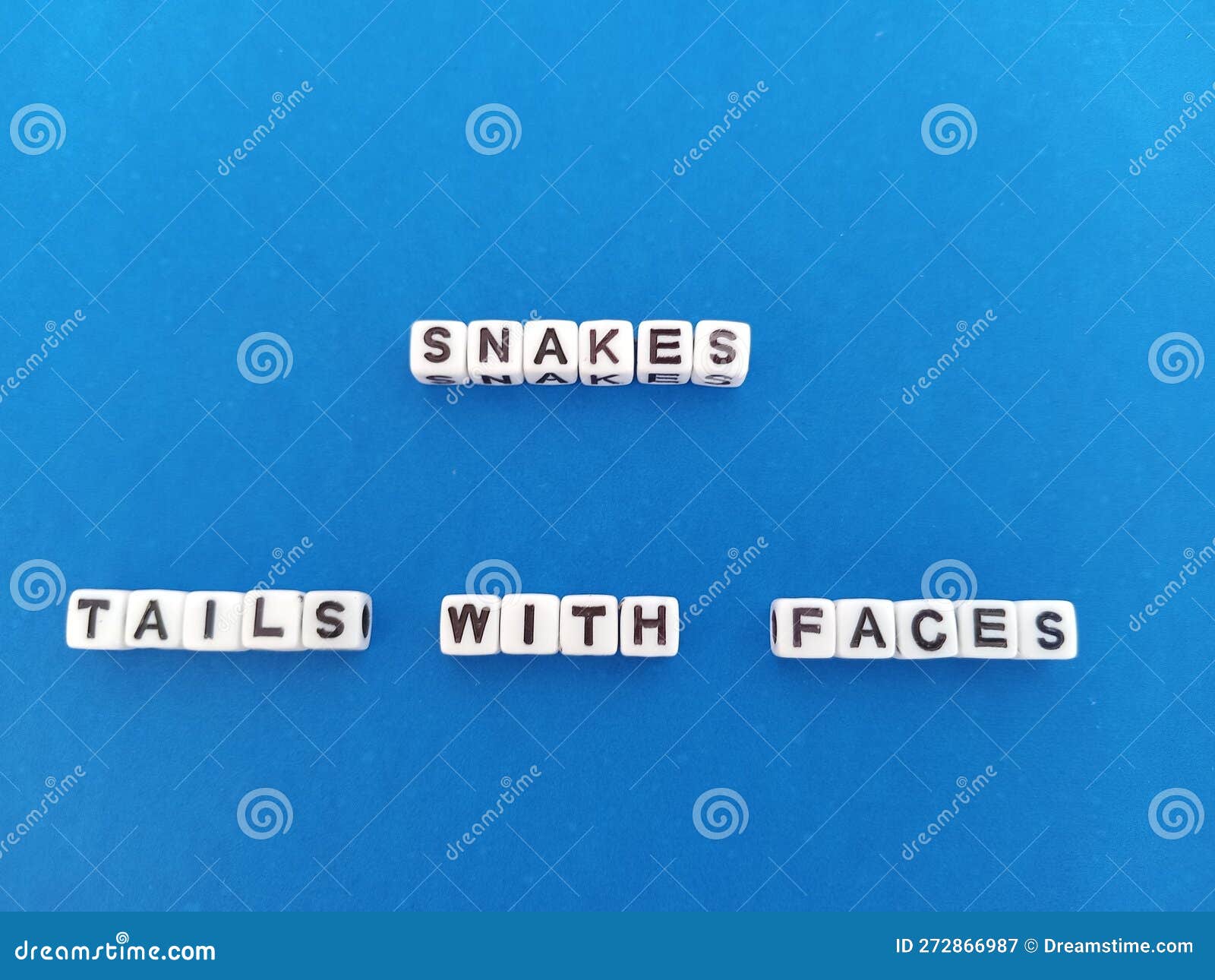 Snakes Tails with Faces on a Blue Background Stock Image - Image of ...