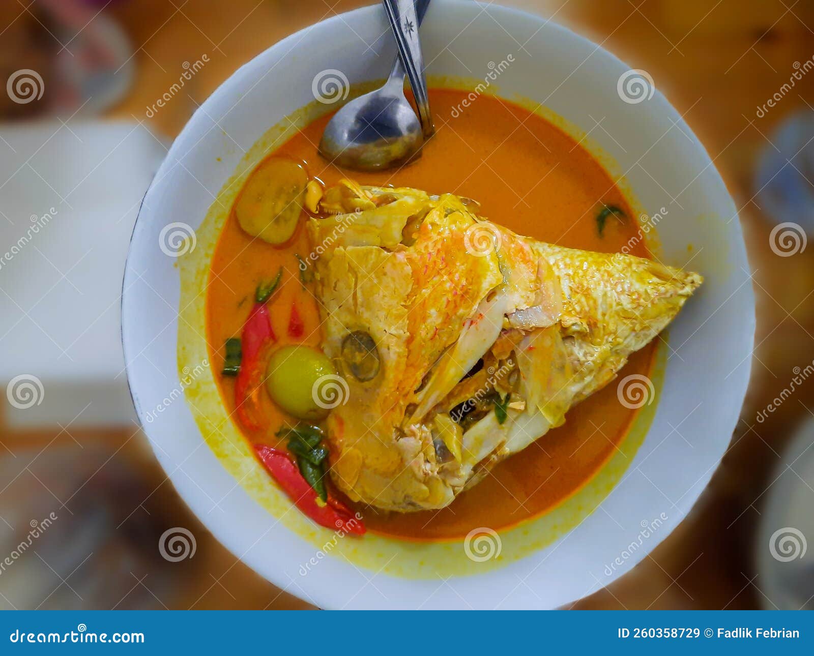 Fish head curry in a bowl stock image. Image of breakfast - 260358729