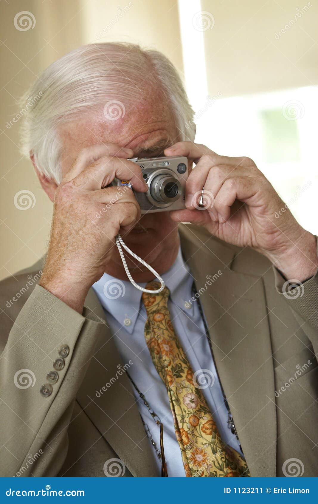Snapping a digital photo stock image. Image of amateur - 1123211