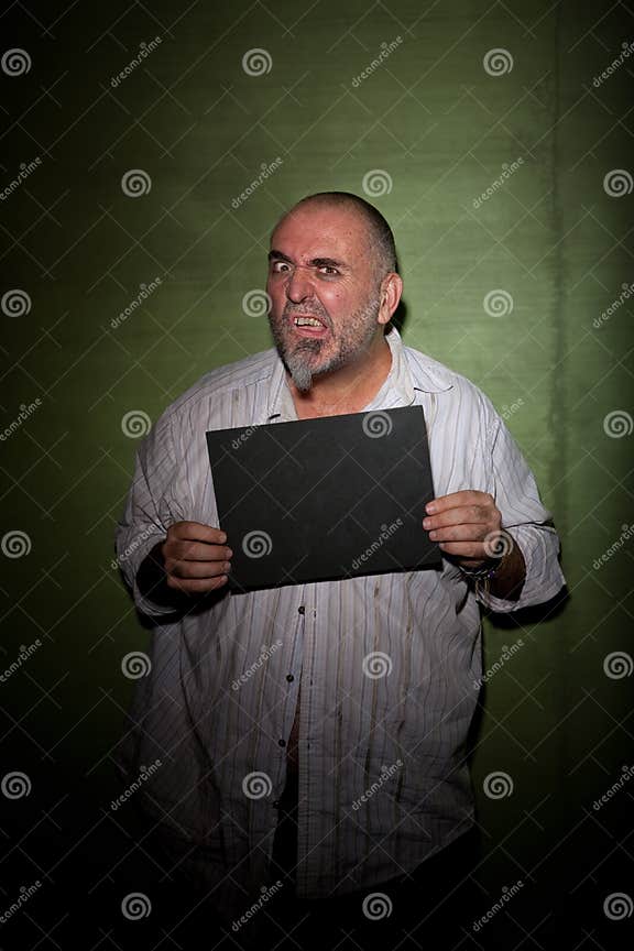 Snarling man in mugshot stock image. Image of scared - 17279693