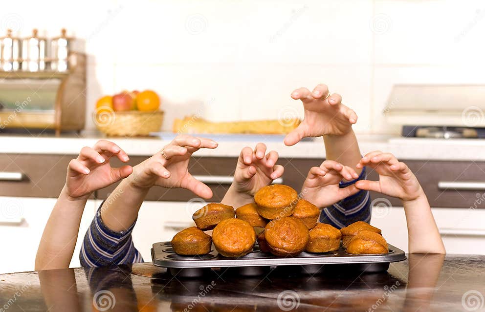 Sneaking cookies stock photo. Image of baking, eating - 22763482