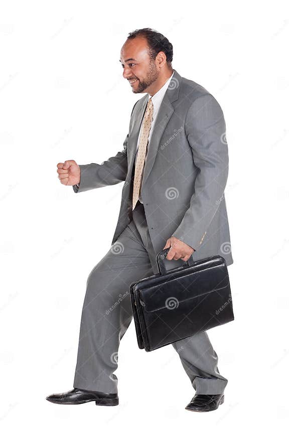 Sneaky businessman stock photo. Image of happy, grey - 10298398