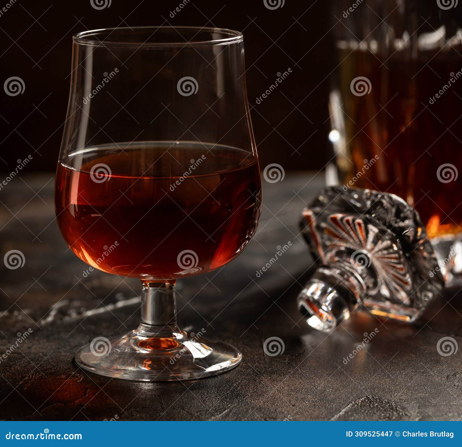 Snifter Of Brandy In Elegant Typical Cognac Glass On Blue Light ...