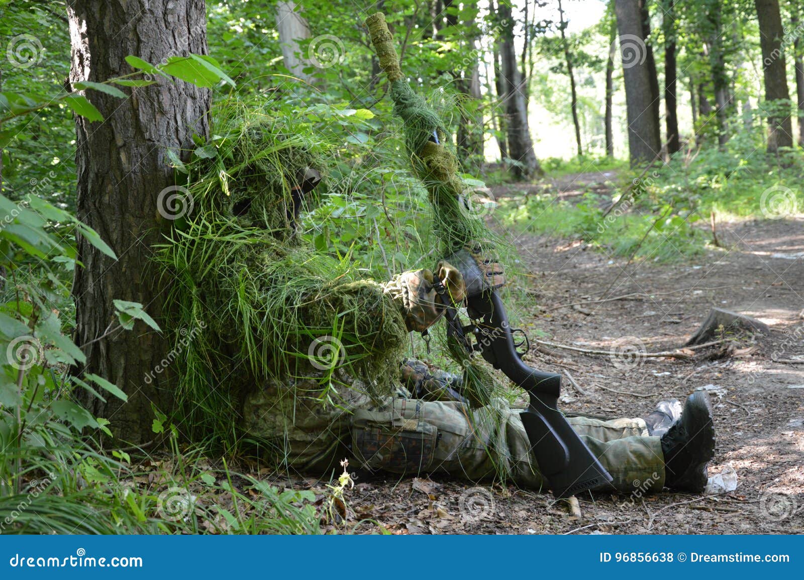 Sniper in the forest stock photo. Image of sniper, forest - 96856638