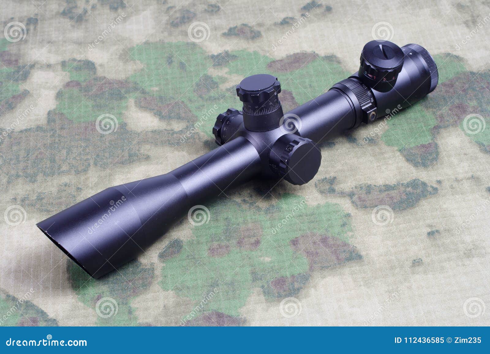 Sniper scope on camouflage stock image. Image of firearm - 112436585