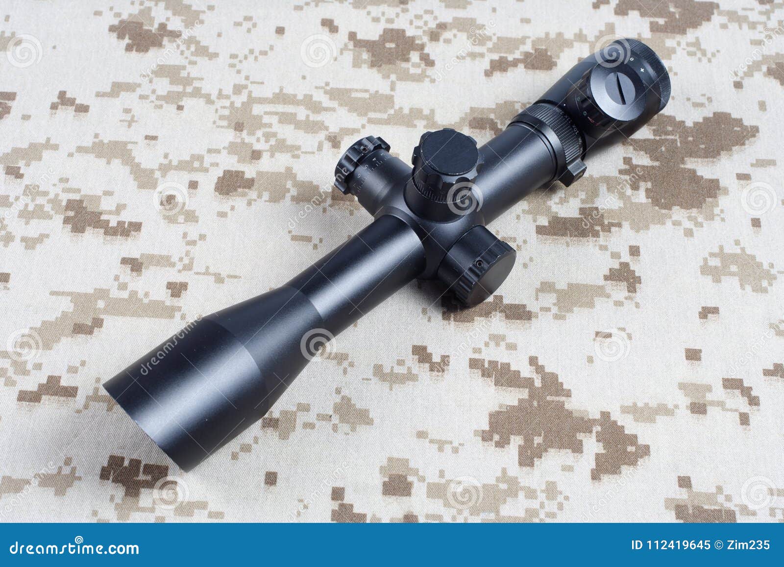 Sniper scope on camouflage stock image. Image of military - 112419645