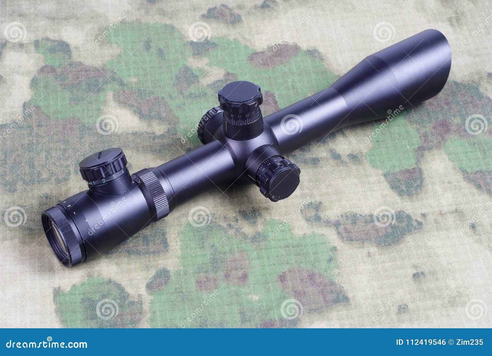 Sniper scope on camouflage stock photo. Image of precision - 112419546