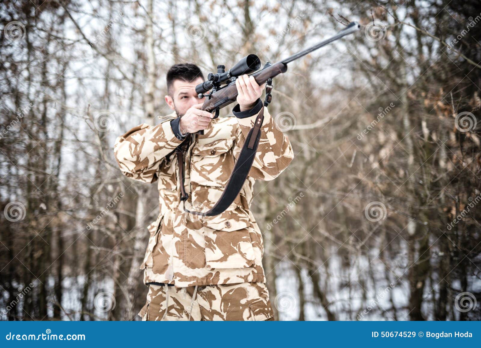 Sniper with Weapon Ready for Combat or Hunting in the Forest Stock ...