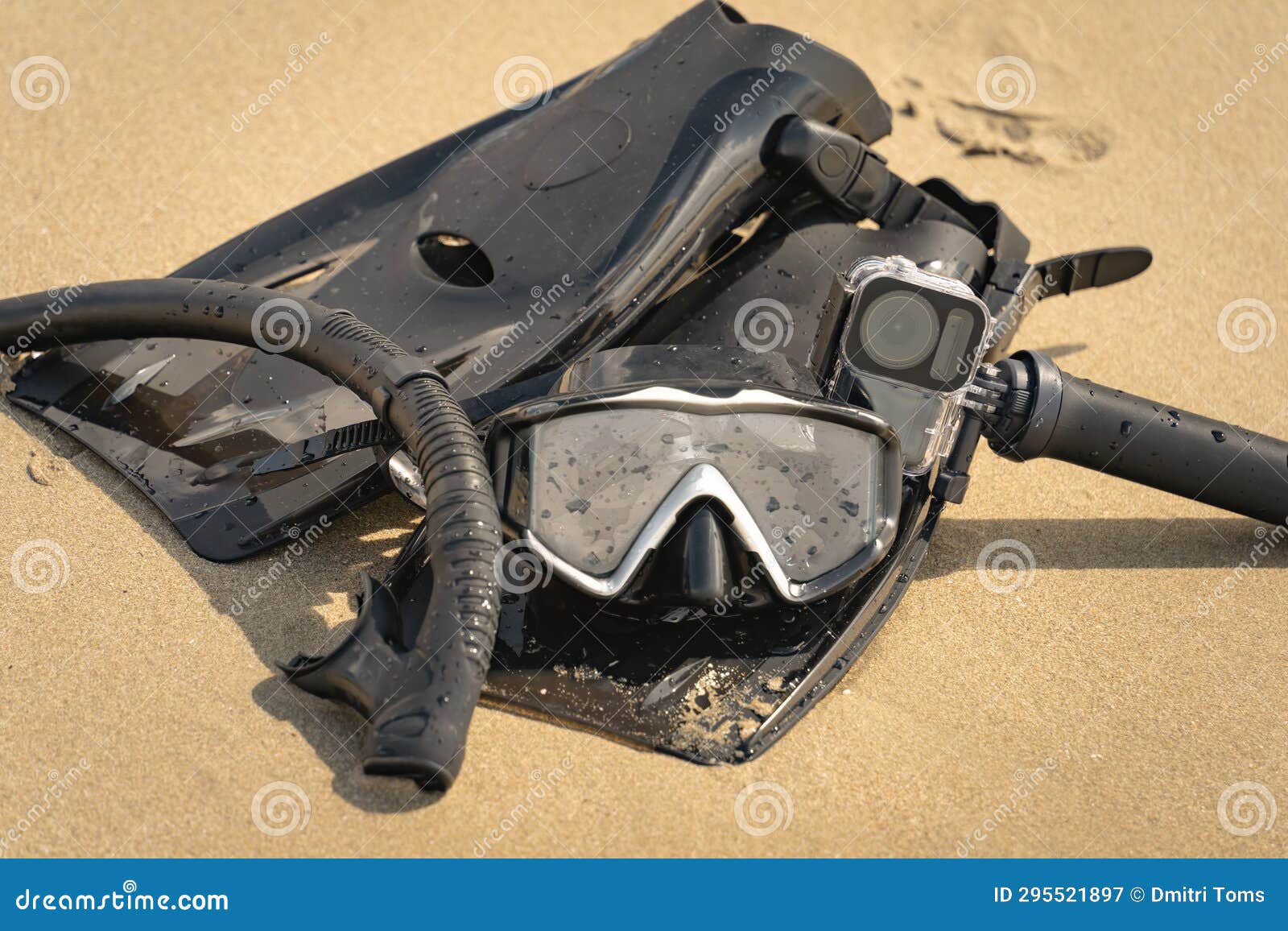 Snorkeling Equipment and Action Camera on a Selfie Stick on the Beach ...