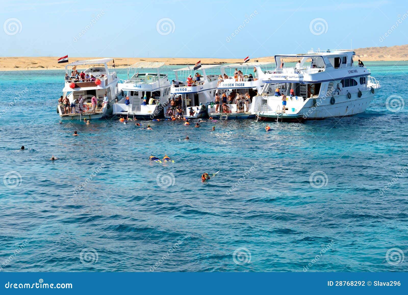 Snorkeling Tourists And Motor Yachts On Red Sea In Ras Muhammad ...