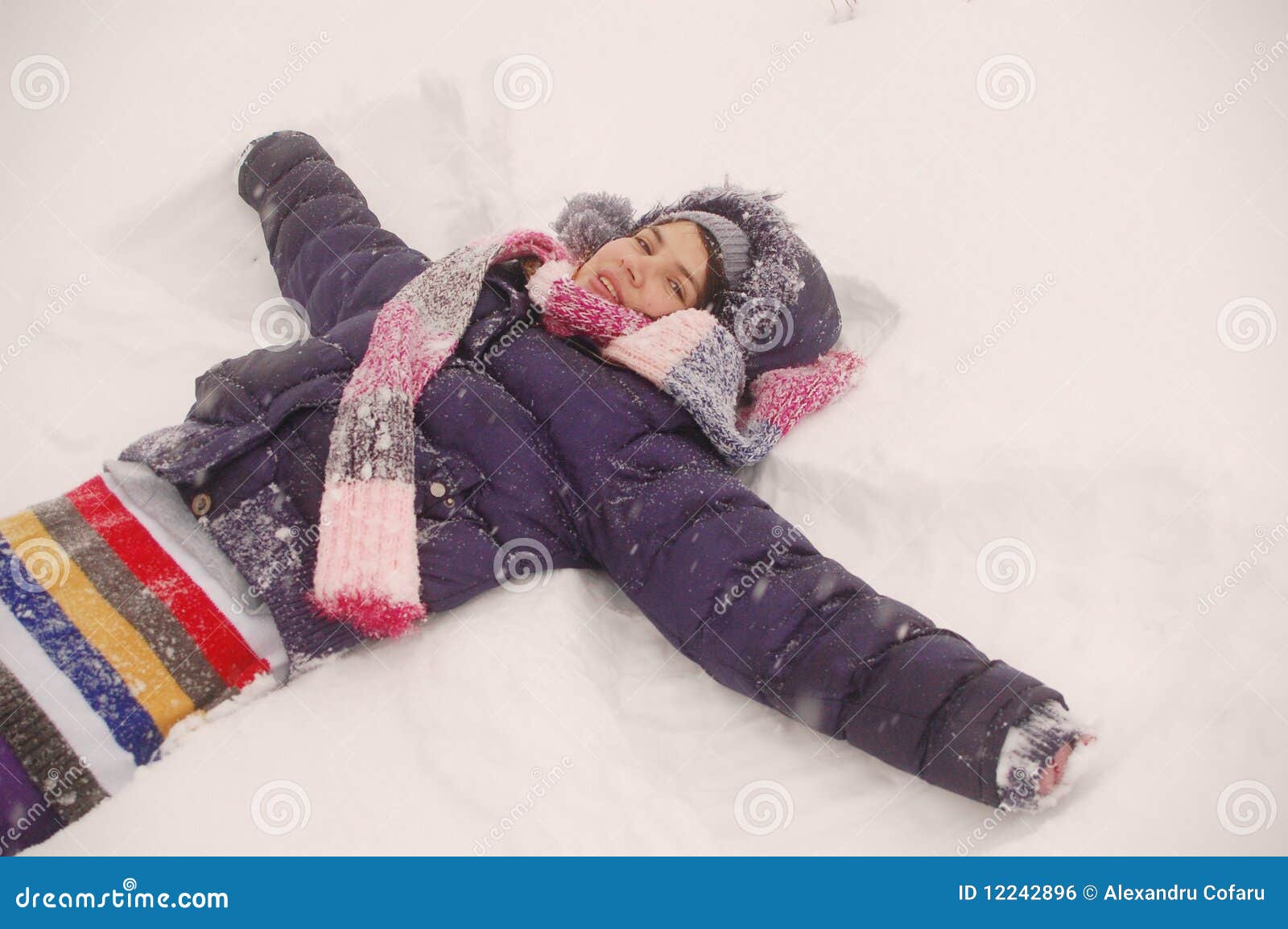 Snow angel stock photo. Image of girl, hair, face, flakes - 12242896