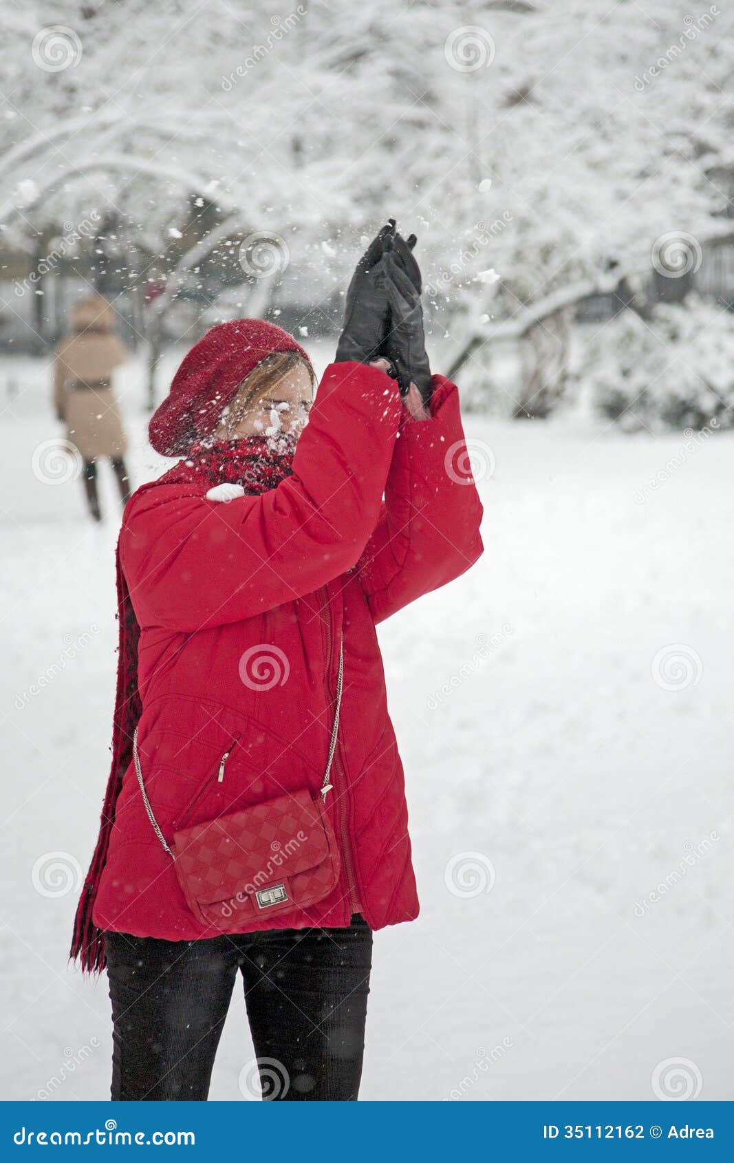 Young Woman Trying To Catch a Snowball Stock Photo - Image of outdoor ...