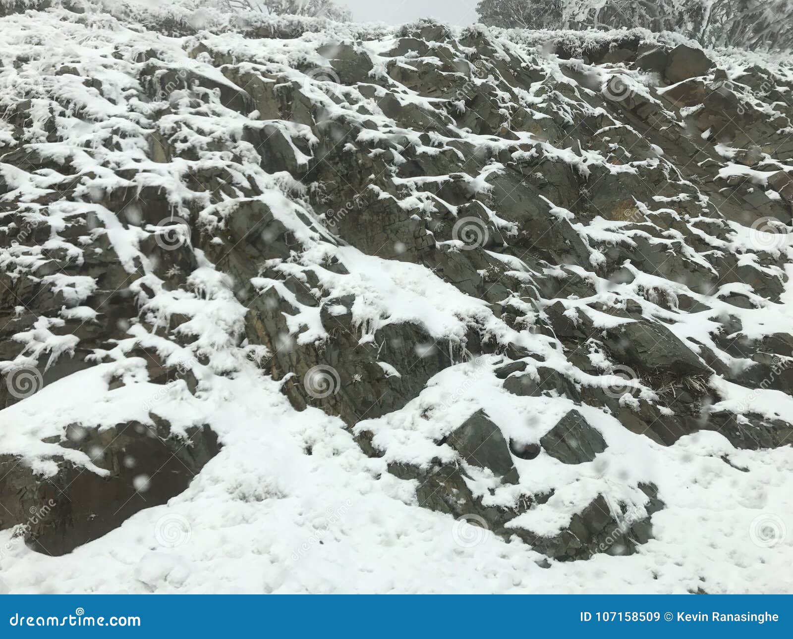 Snowy cliffs stock image. Image of blanketing, cliffs - 107158509