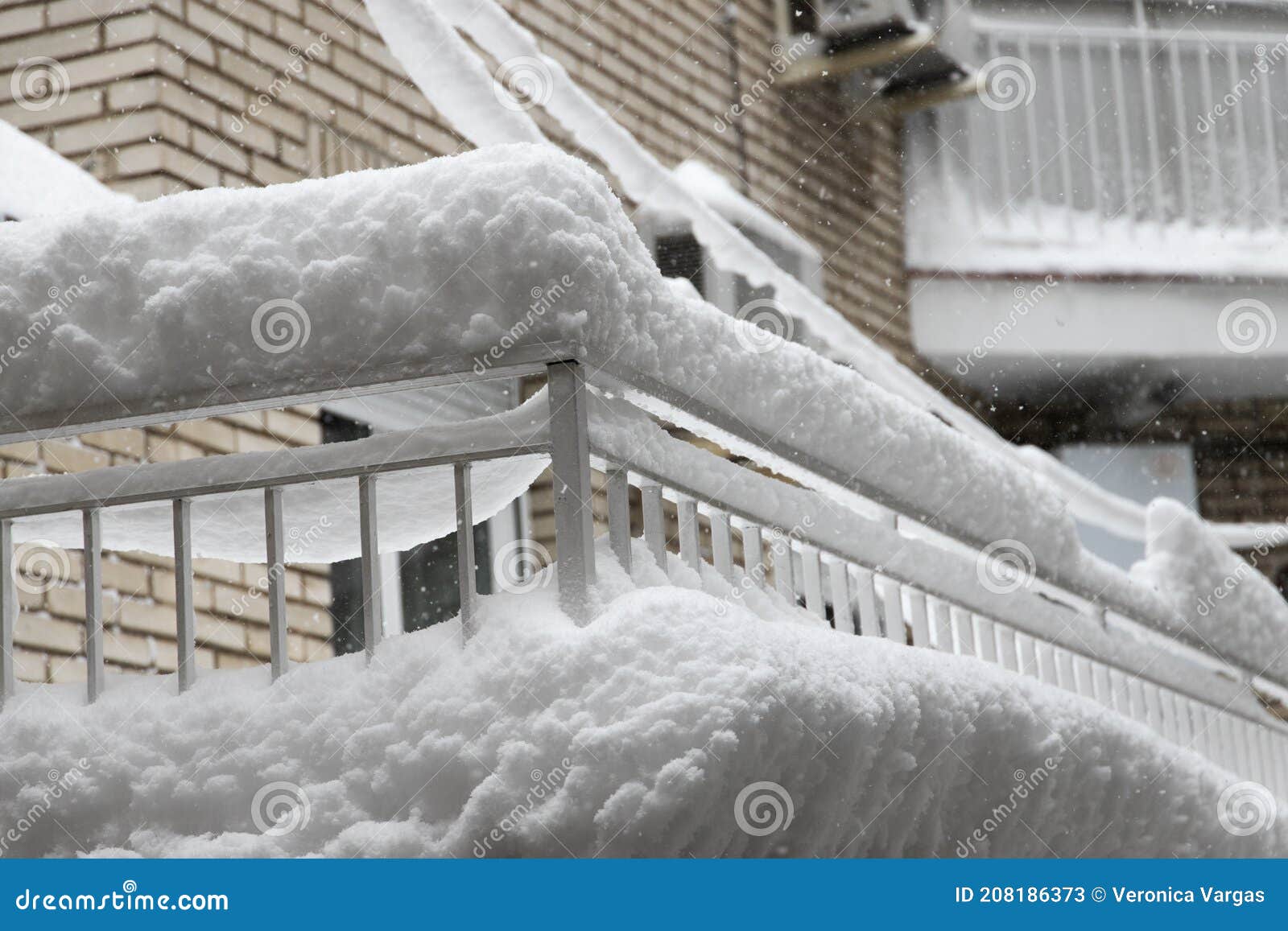 Snow Blocks on Top of Balcony Railing Stock Image - Image of frost ...