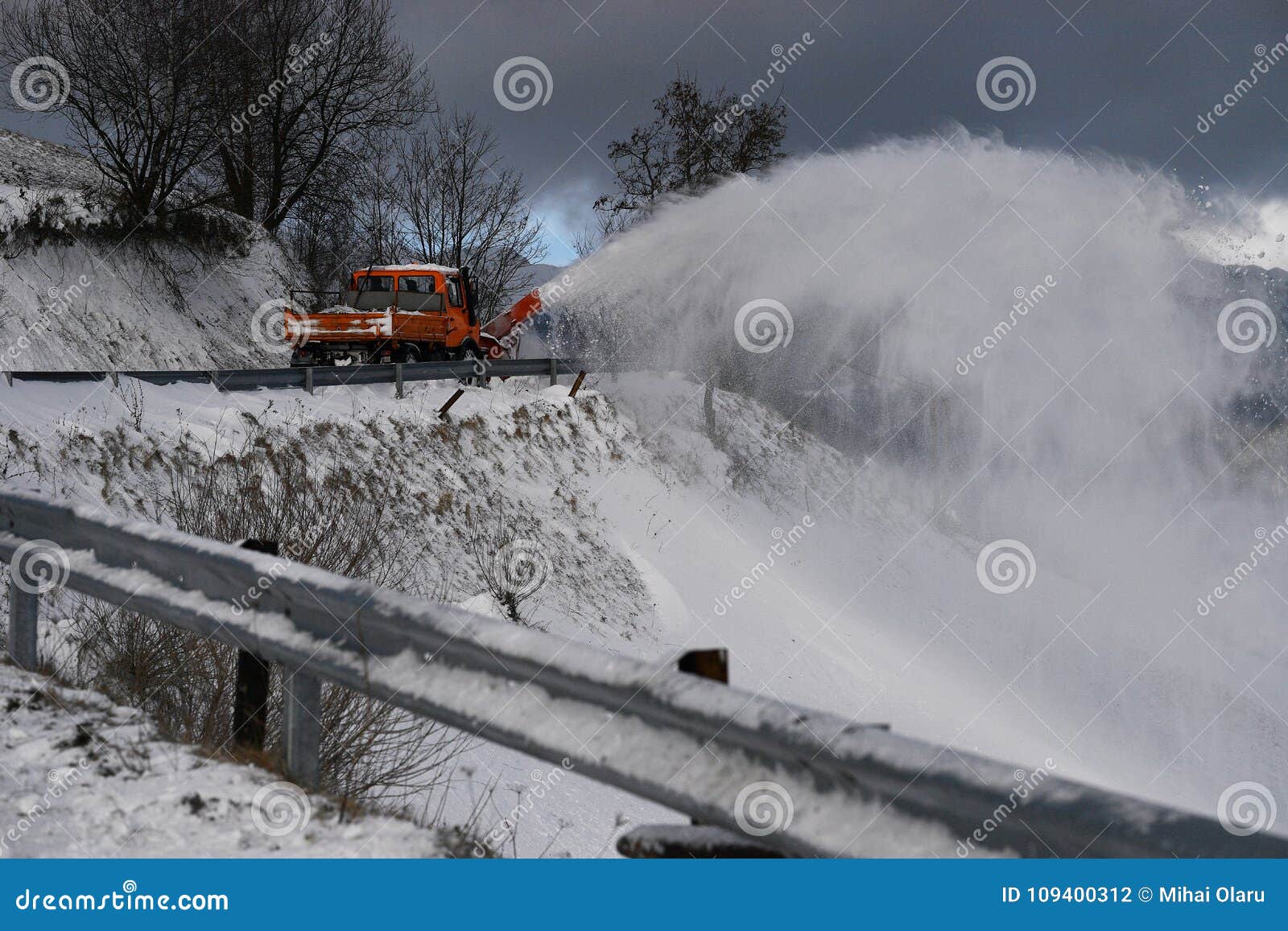 Snow blower on the road stock photo. Image of tree, forest - 109400312