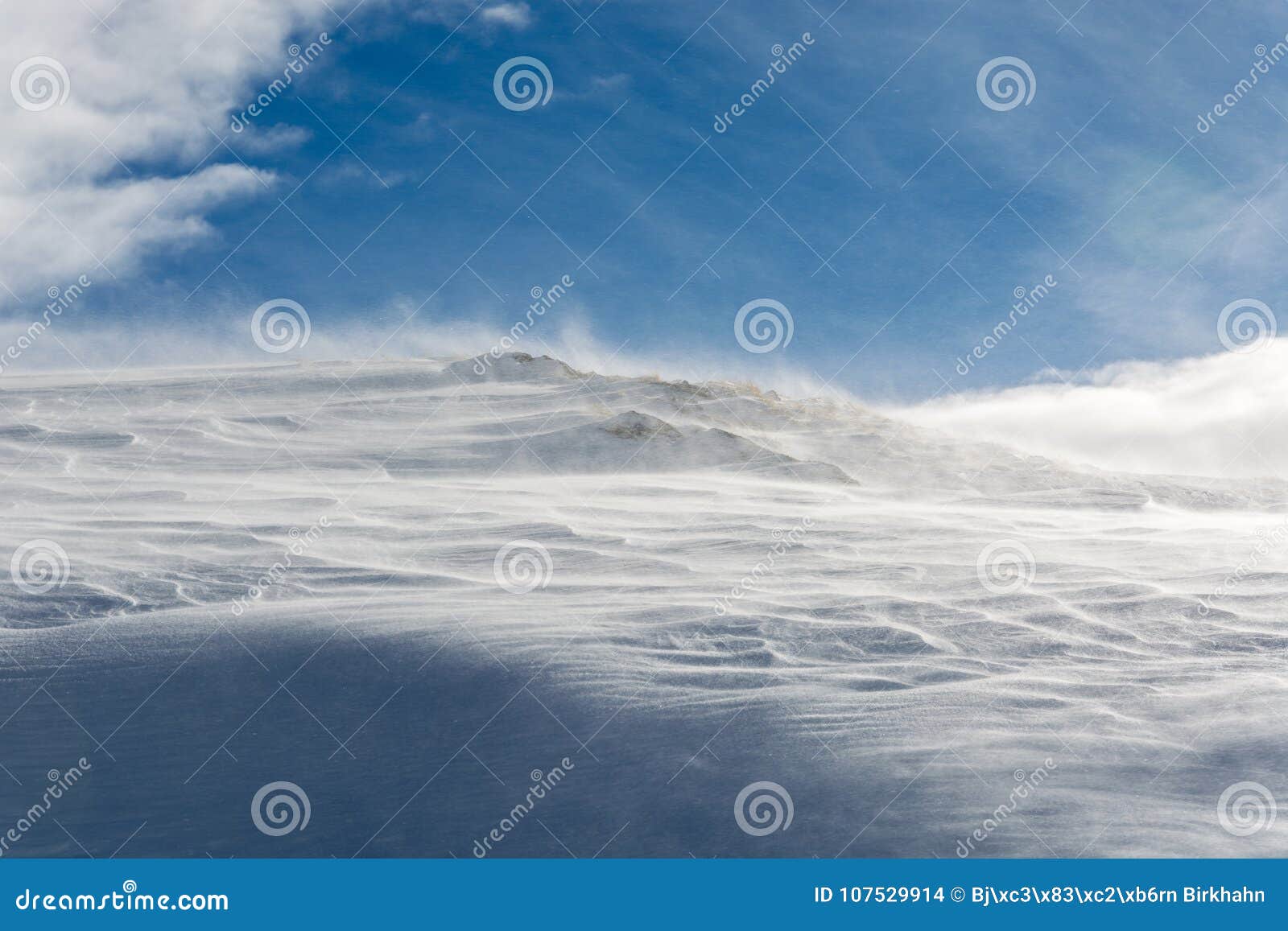 Snow Blowing Over the Edge of a Mountain Stock Photo - Image of summit ...