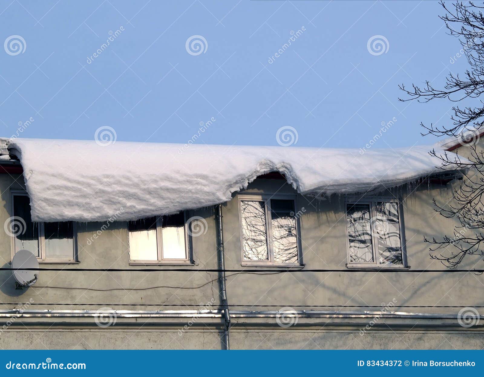 The Snow Canopy Which is Dangerously Hanging Down from a Roof Stock ...