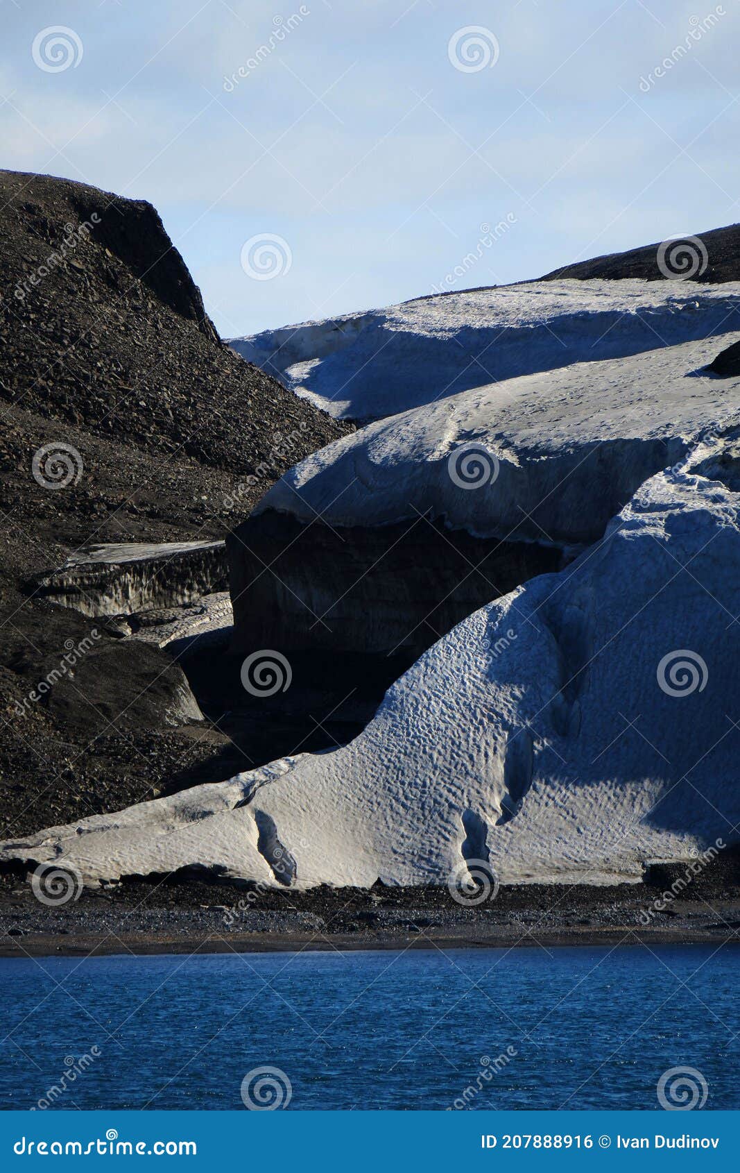 Snow cap stock photo. Image of cliff, winter, water - 207888916