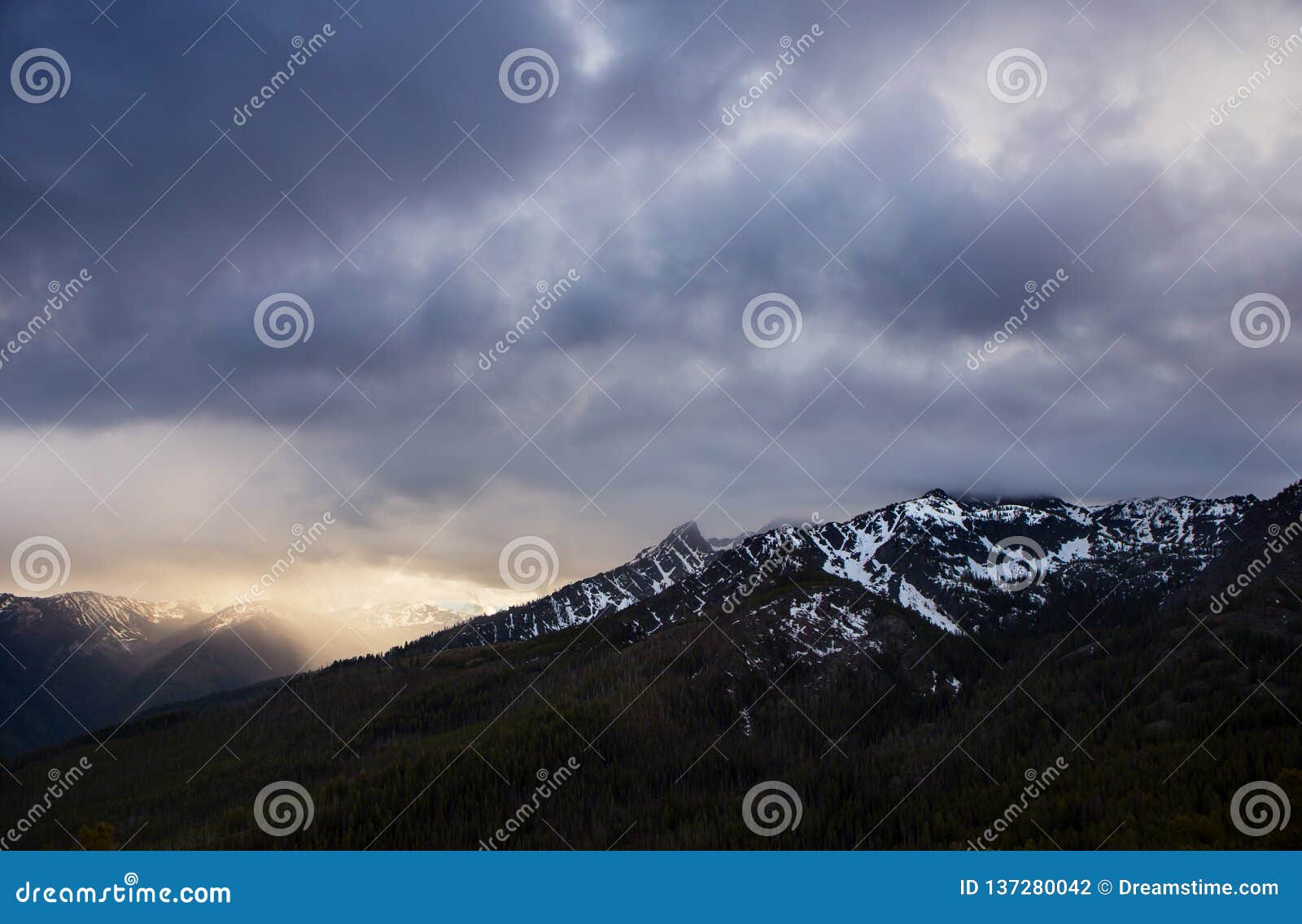 Sun Breaks Over Seven Devils Peaks Stock Photo - Image of landscape ...