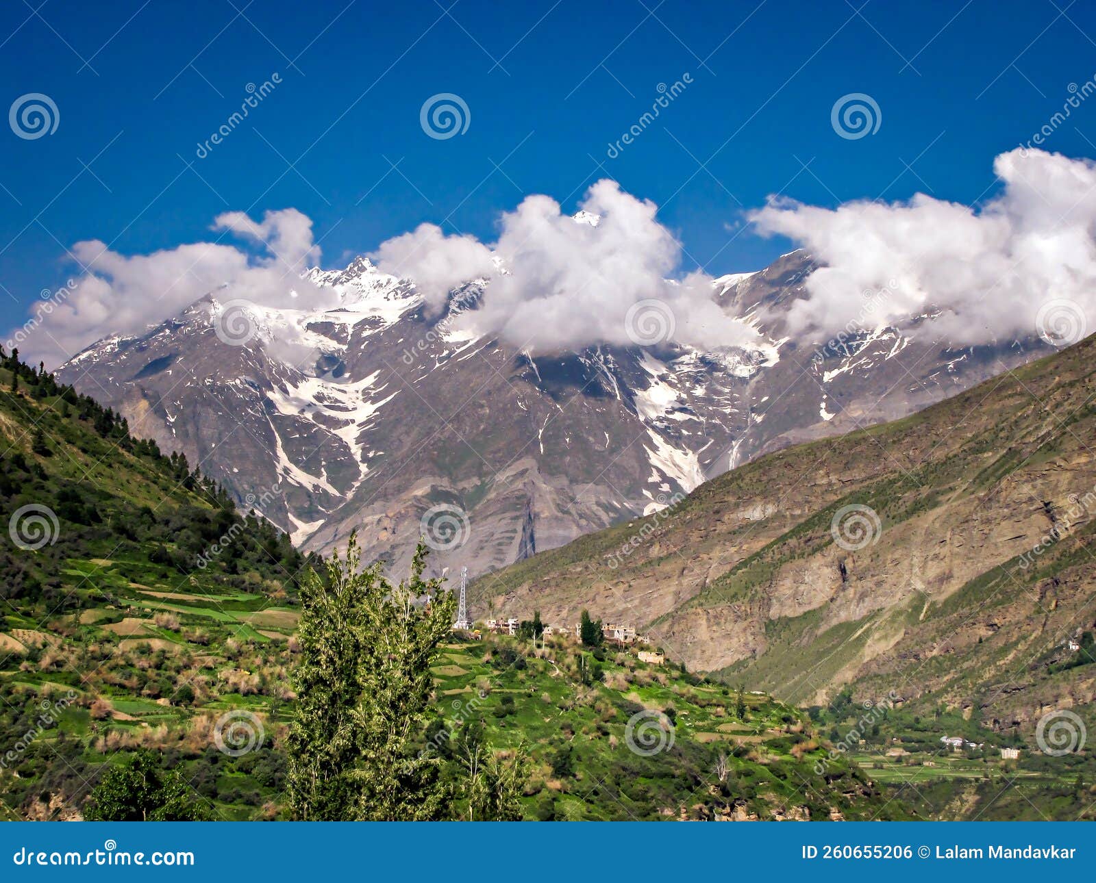 Snow Clad Mountains with White Clouds in Blue Sky Background on Way To ...