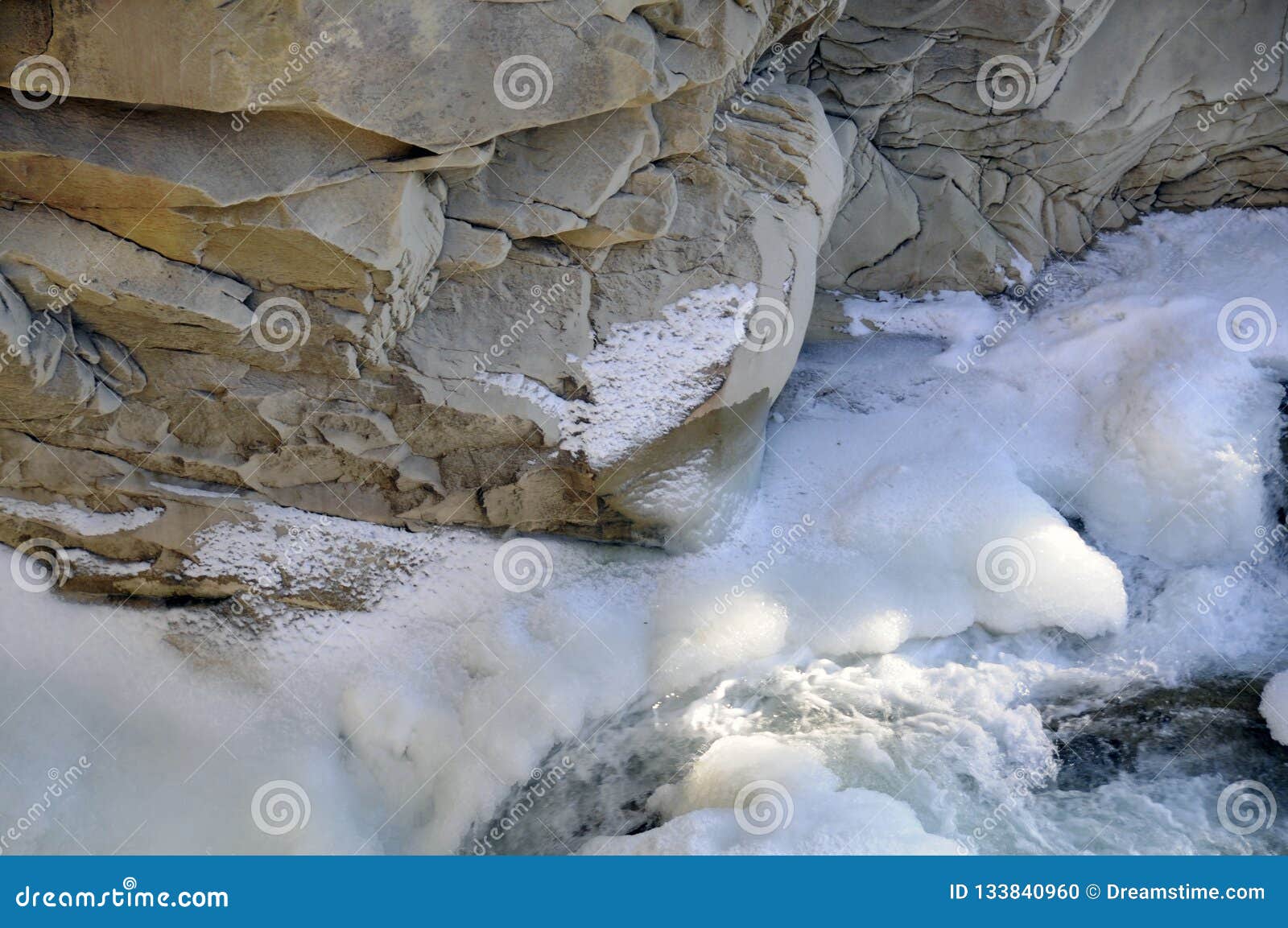 Snow on a cliff stock photo. Image of scenic, travel - 133840960