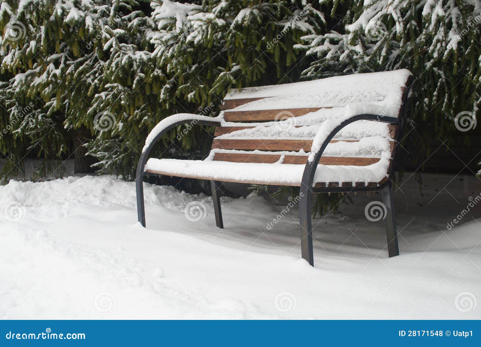 Snow-covered bench stock photo. Image of snowdrift, bench - 28171548